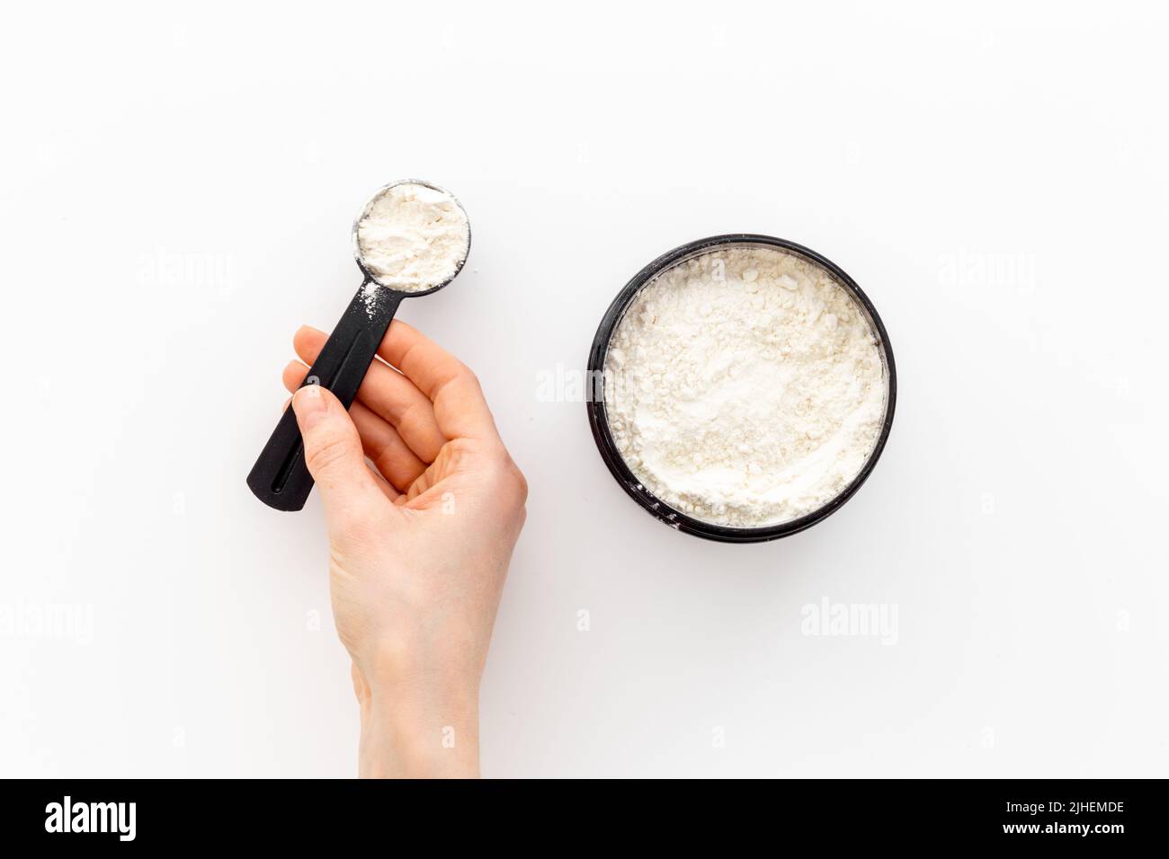 Whey protein powder in jar. Sport food supplement and fitness diet ...