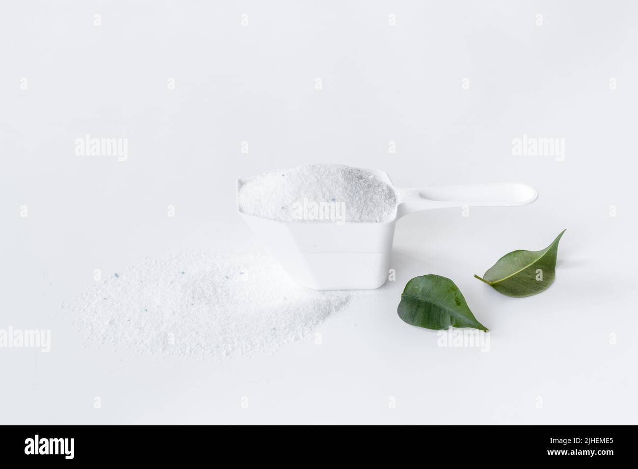 White laundry detergents powder with cup for laundry Stock Photo - Alamy