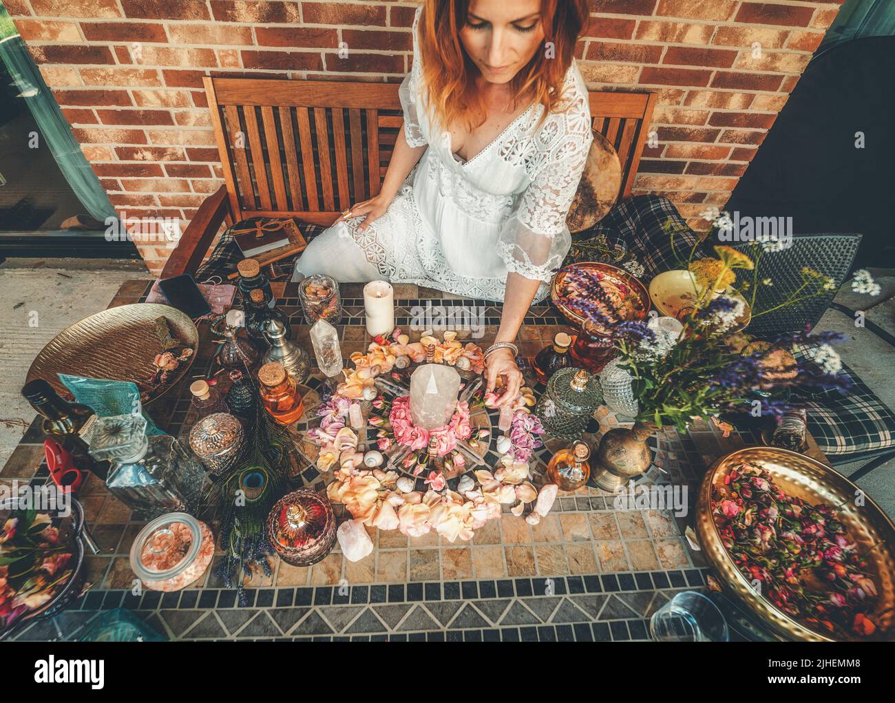 beautiful altar with crystals and rose flowers Stock Photo - Alamy
