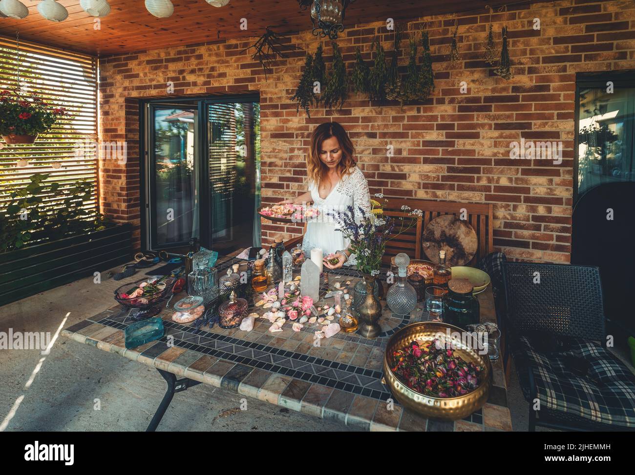 beautiful altar with crystals and rose flowers Stock Photo - Alamy
