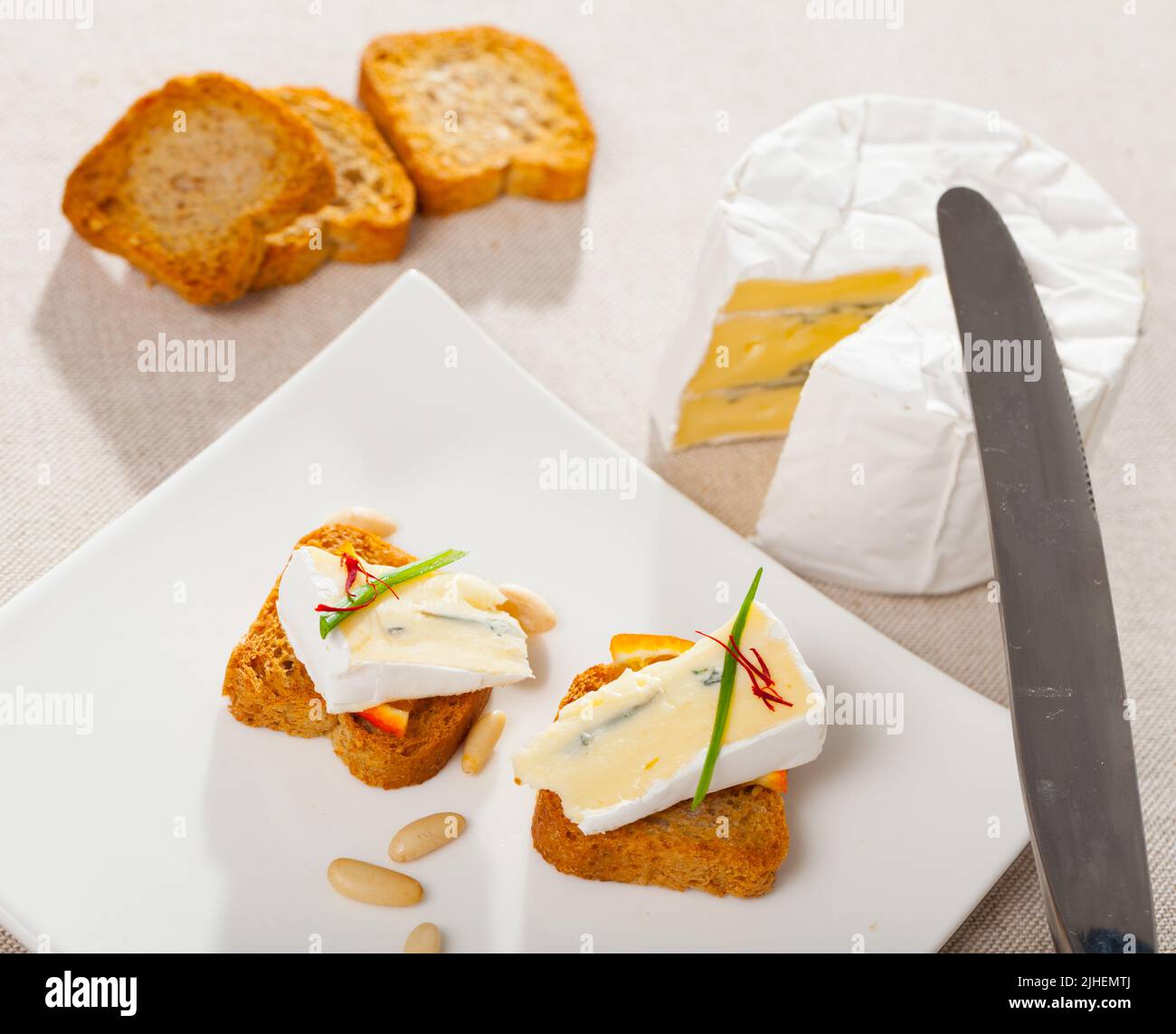 Canape with soft blue cheese Stock Photo - Alamy