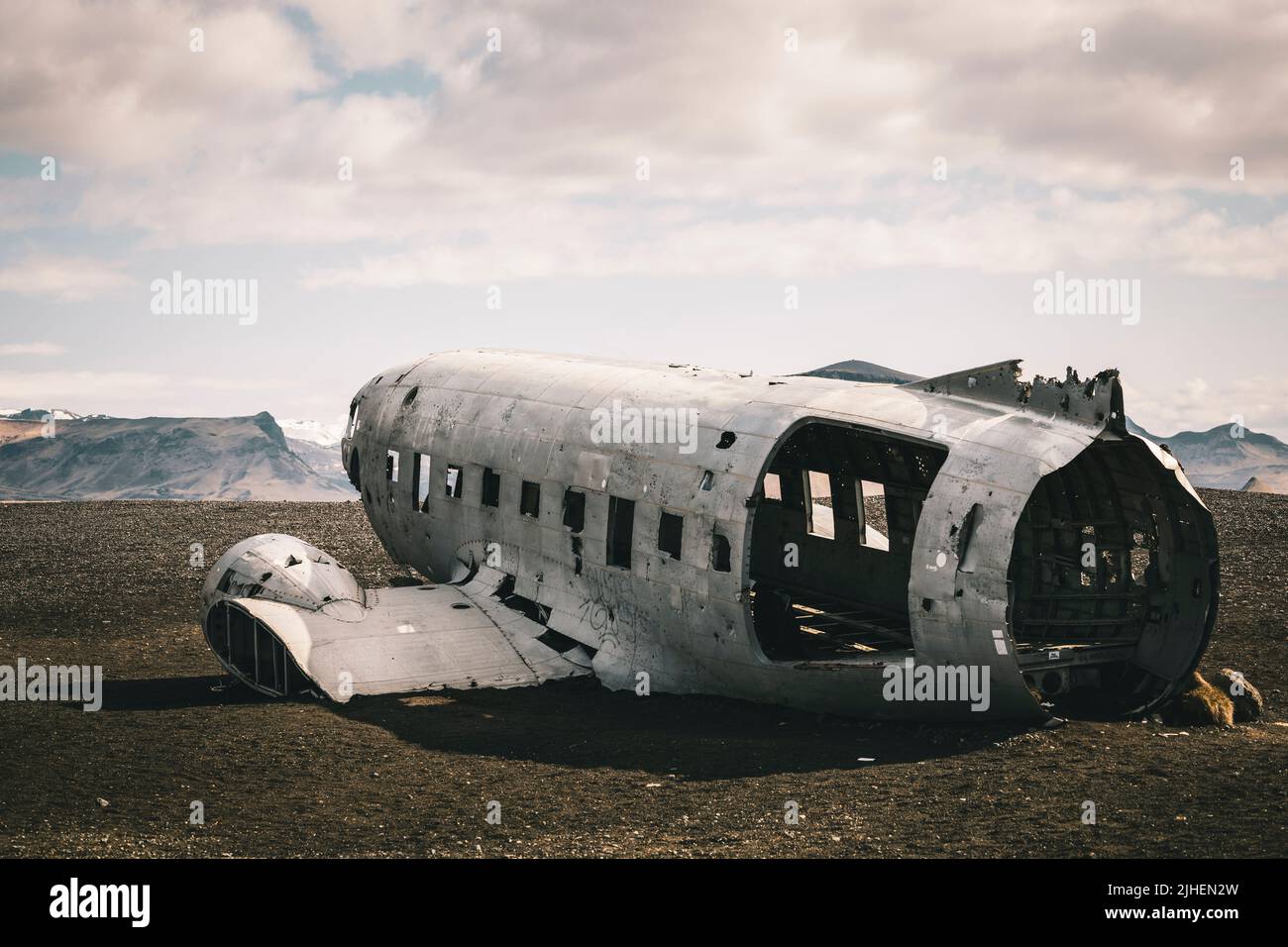 The wreckage of the crashed airplane in Solheimasandur, Iceland under a ...