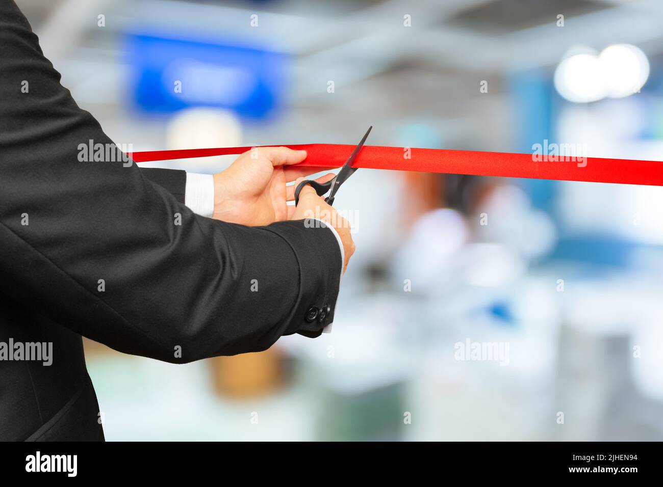 Hand businessman cutting pair hi-res stock photography and images - Alamy