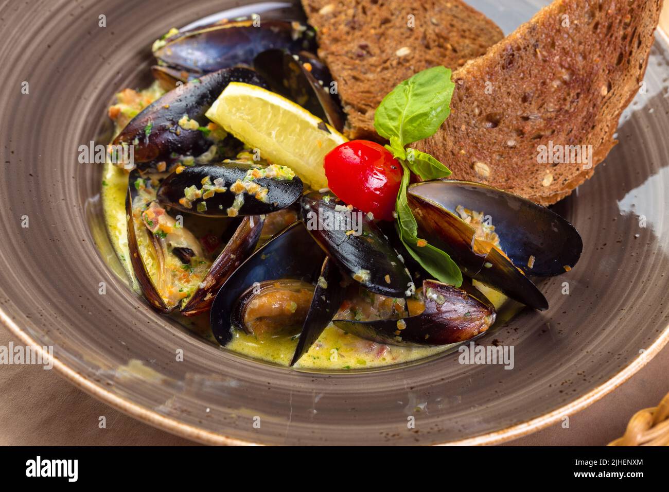 Turkish Delicious Rice Stuffed Mussels serving with tomato Stock Photo ...