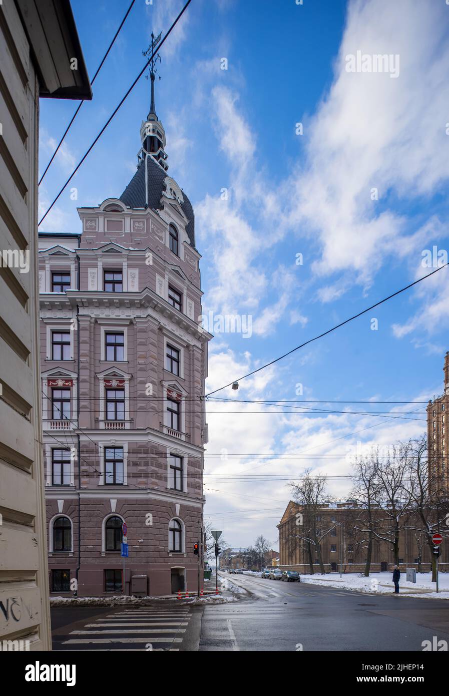 Winter cityscape of Riga. Modern architecture. Crossroad. Snow on road ...
