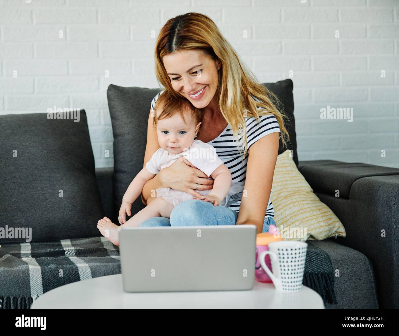 mother baby laptop computer child woman working business parent mom ...