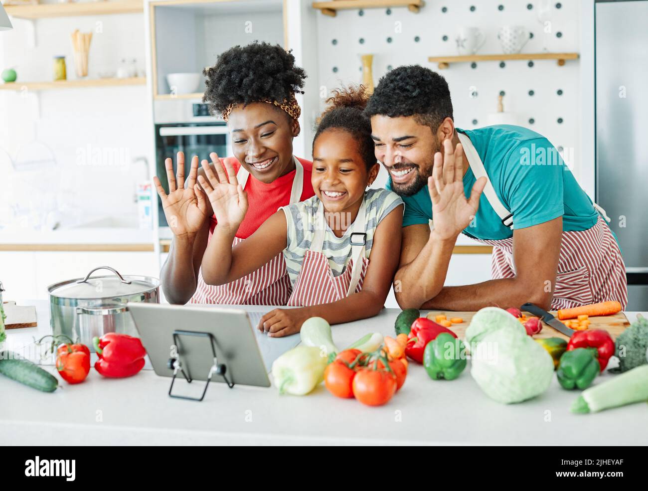 family child kitchen food daughter mother father cooking preparing ...