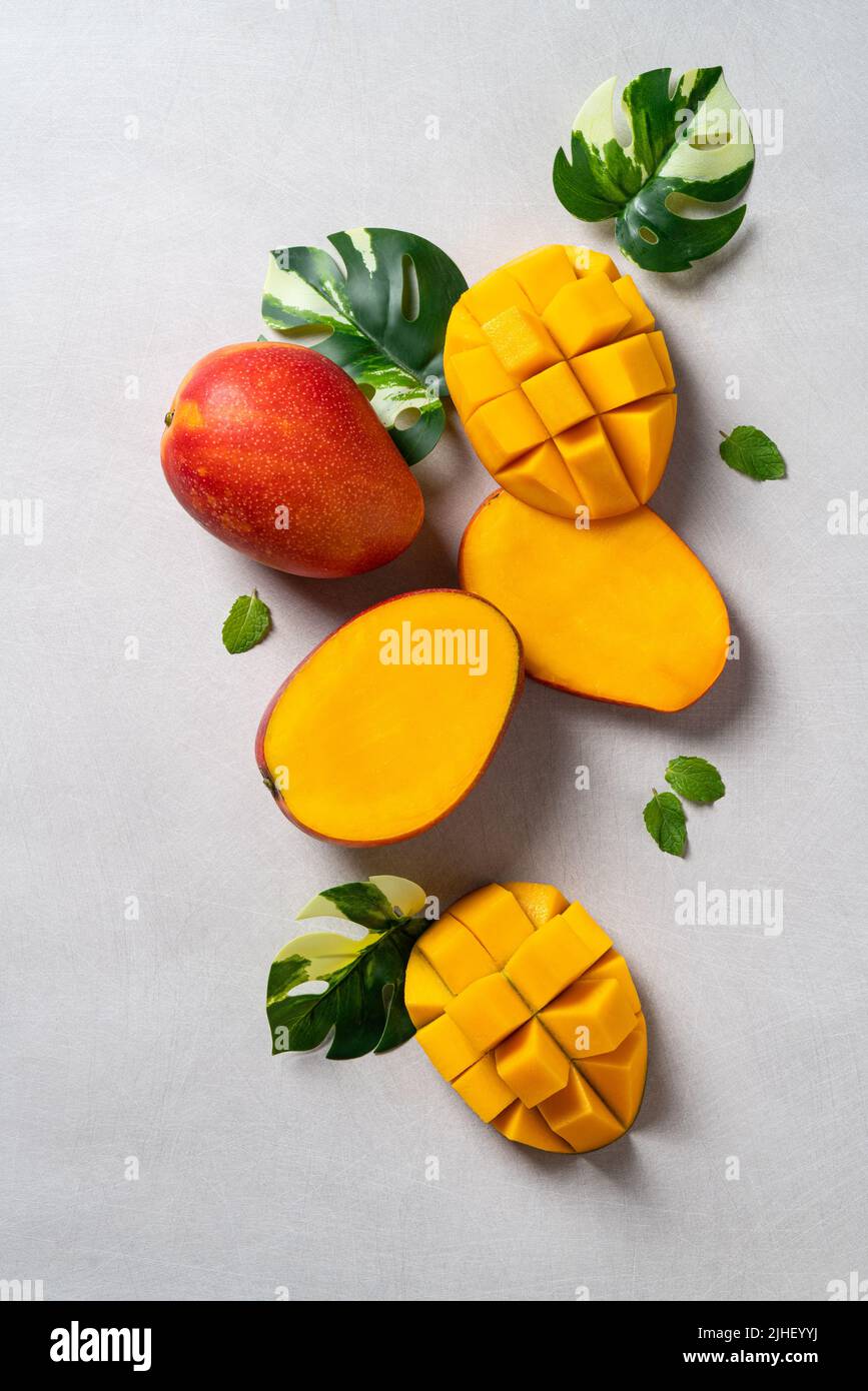 Mango background design concept. Top view of diced fresh mango fruit ...
