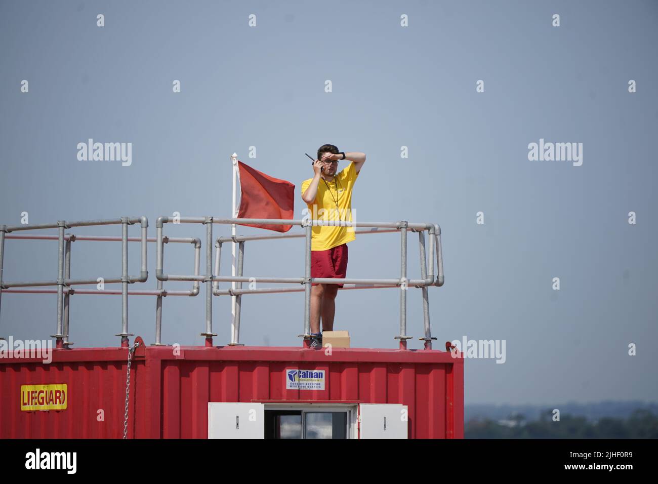 A lifeguard on watch at Malahide beach near Dublin. Picture date ...