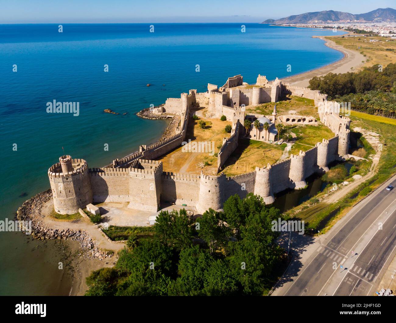 Drone view of medieval castle Mamure Kalesi on Mediterranean coast ...