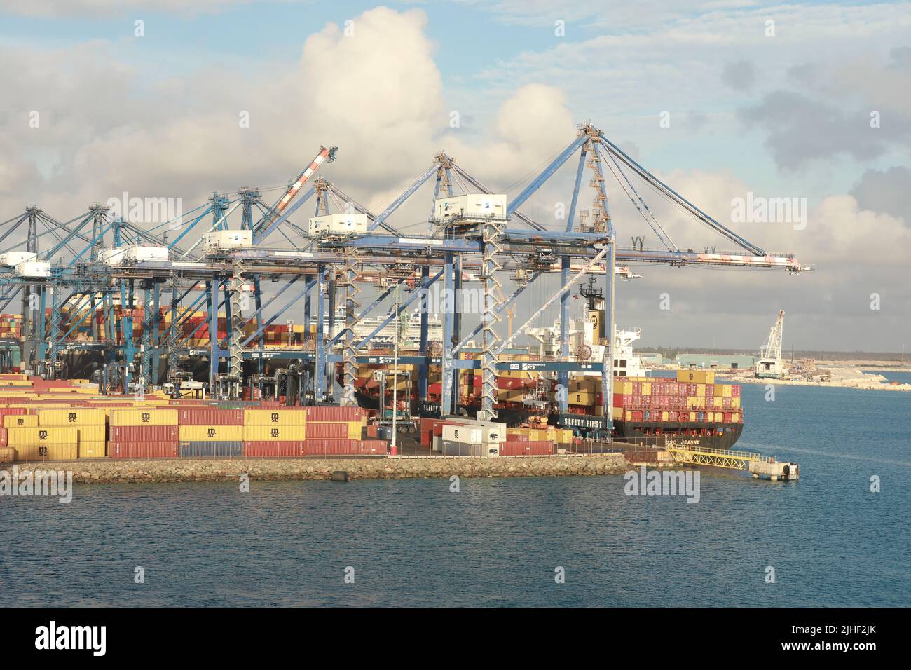 Container ship at industrial port in import export business logistic ...