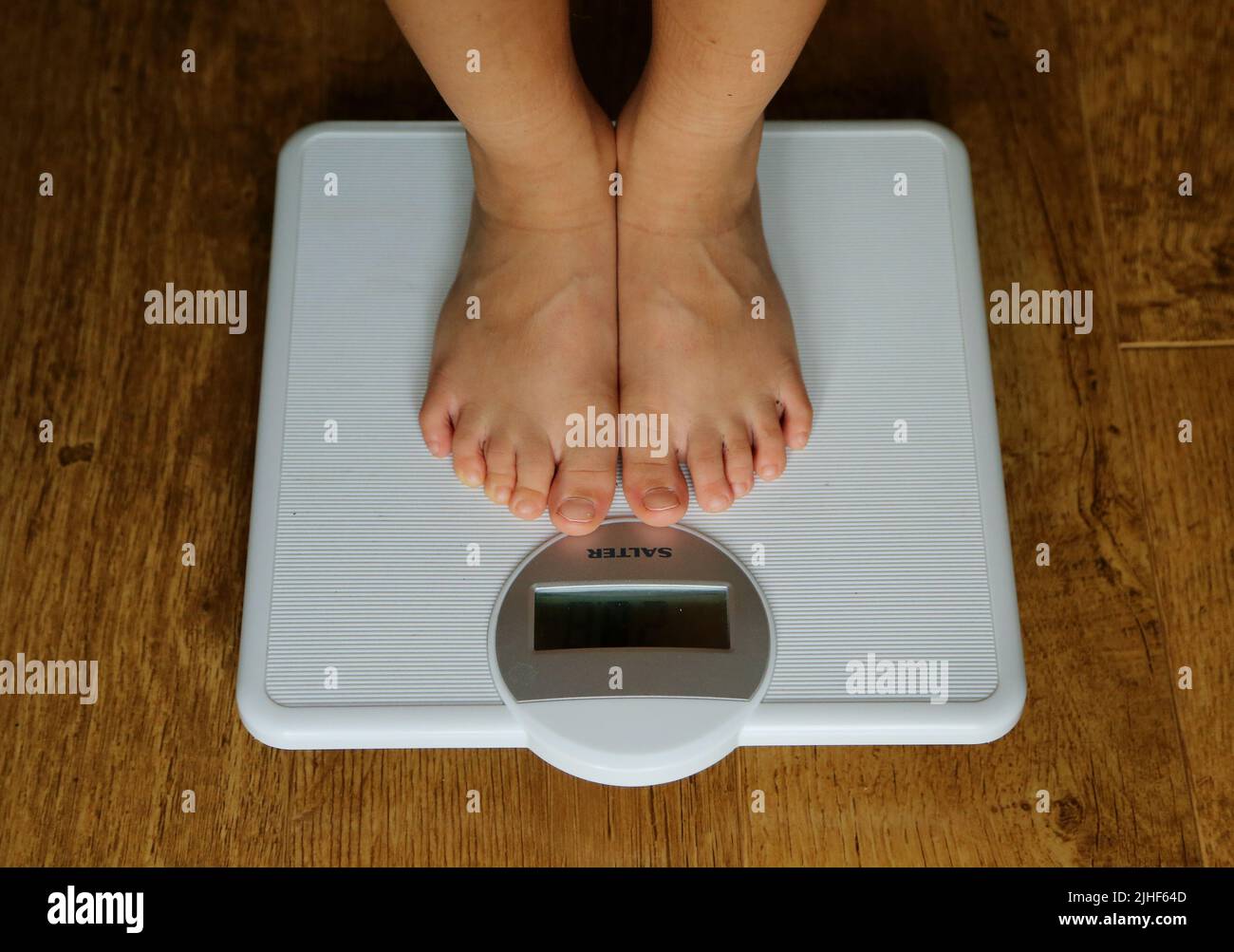 Child rise weight hi-res stock photography and images - Alamy