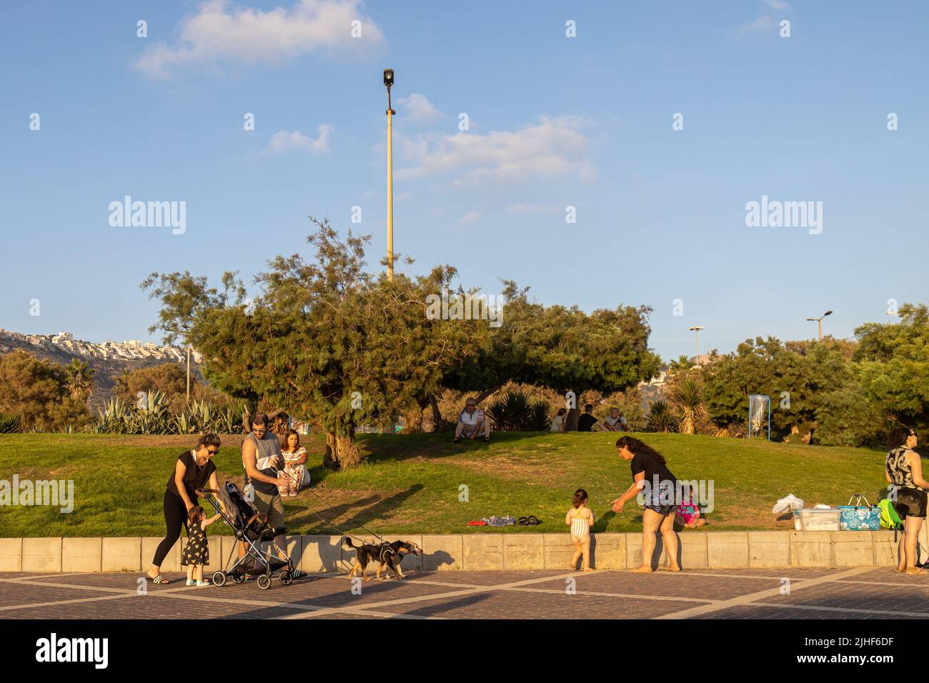 Haifa, Israel -10.07.2022, People relax, have a picnic in the park next ...