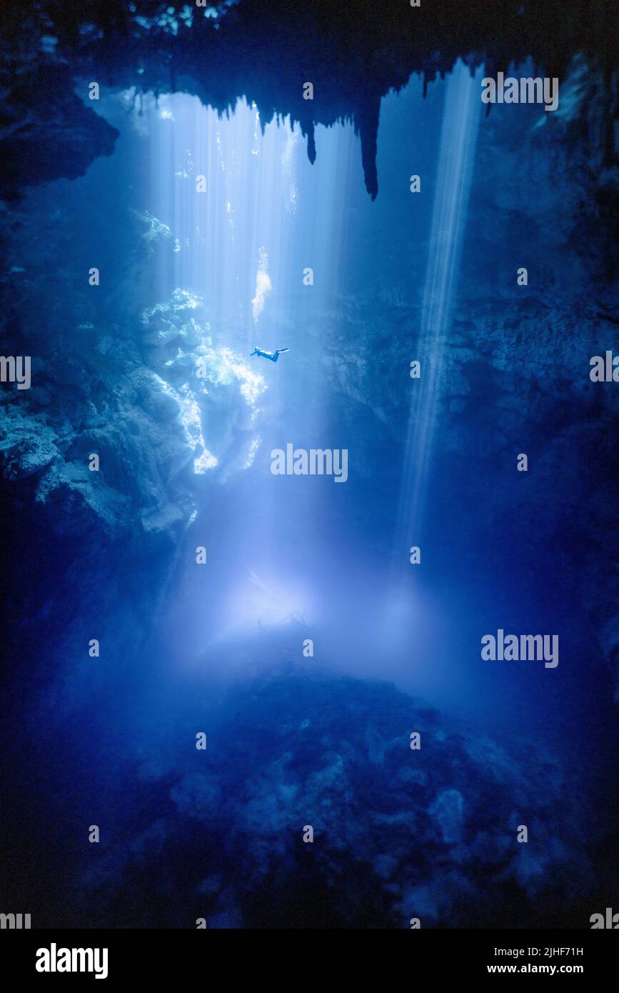 A magnificent shot showing the scale of the impressive cave. TULUM ...