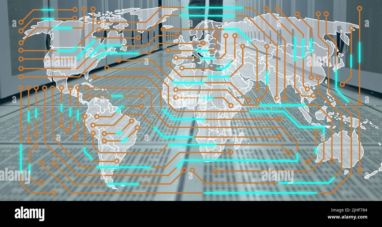 Image of computer circuit board and world map over businessman in ...
