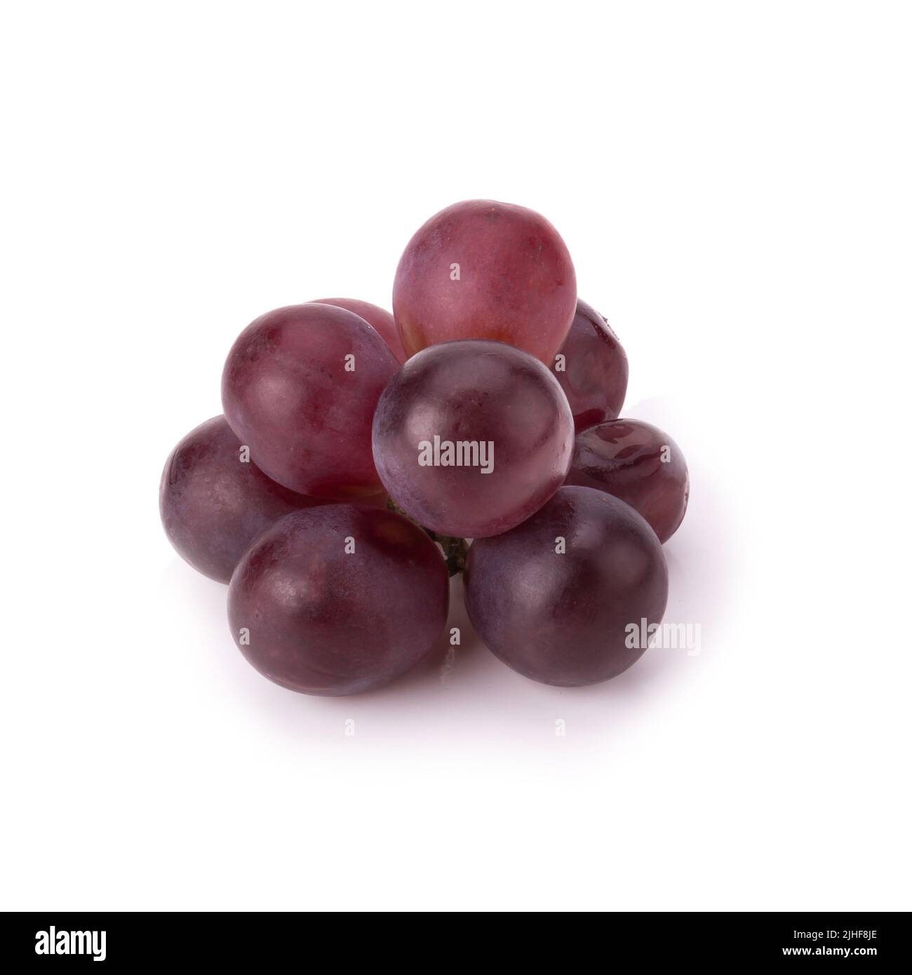 Ripe red grape with leaves isolated on white Stock Photo - Alamy
