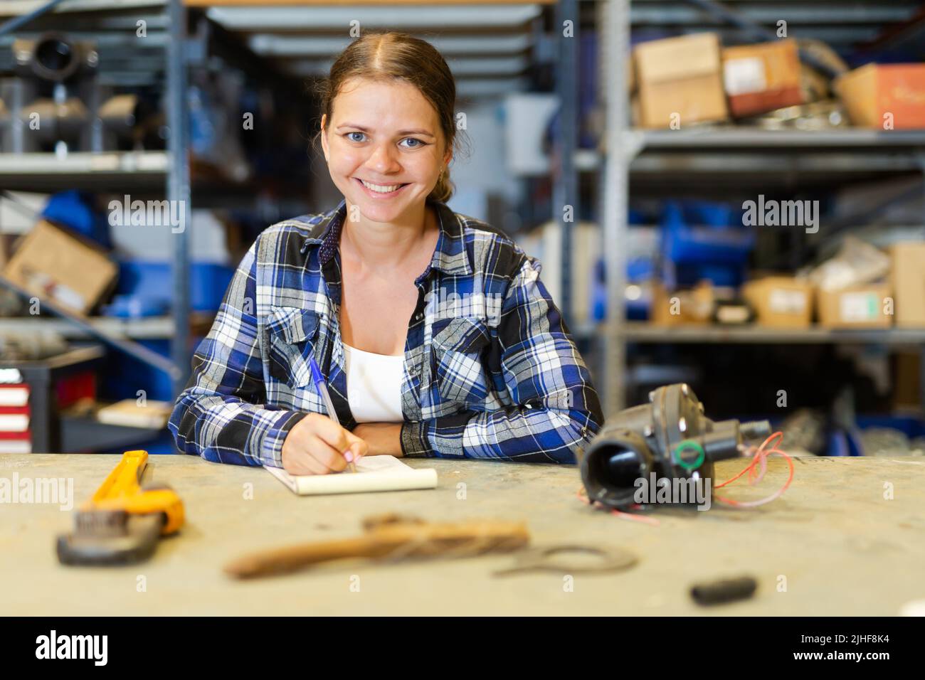 Young smiling girl checking order list Stock Photo - Alamy