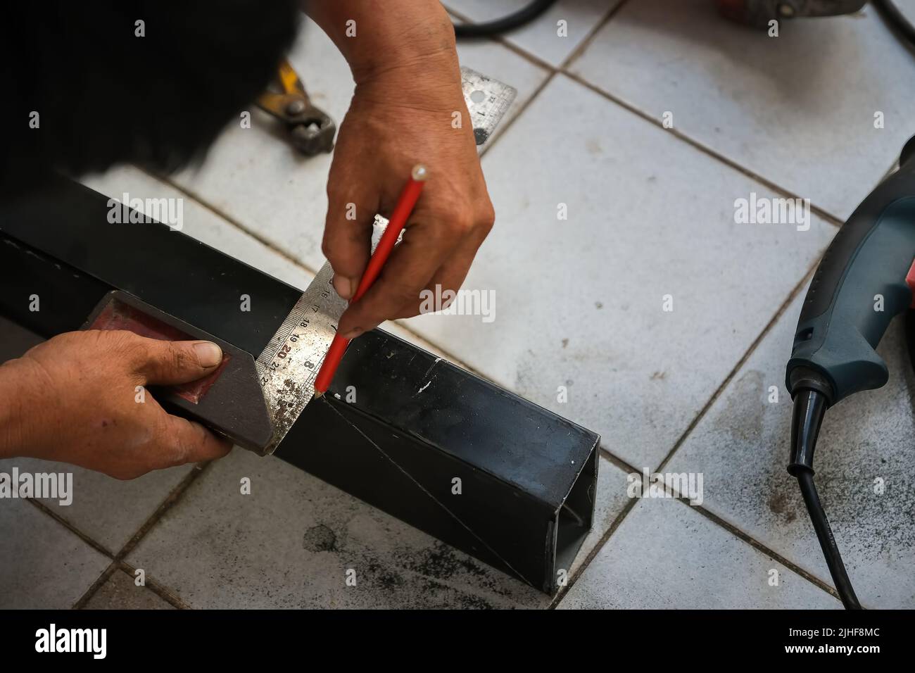 Using a ruler hi-res stock photography and images - Alamy