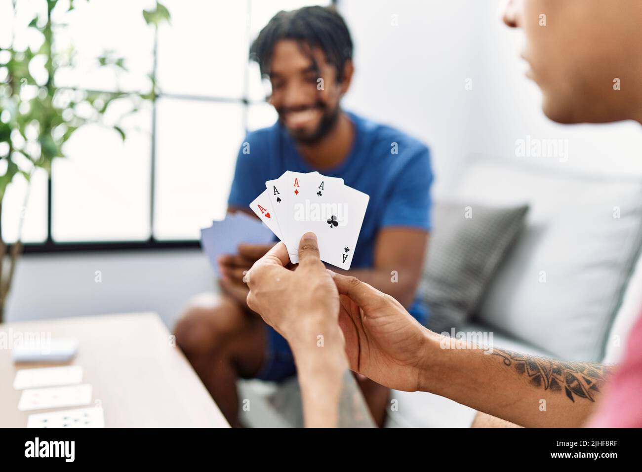 Two People Playing Cards