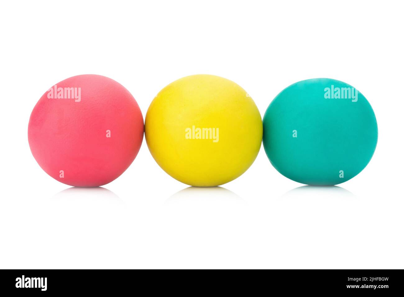 three red yellow green ball on white background closeup Stock Photo - Alamy