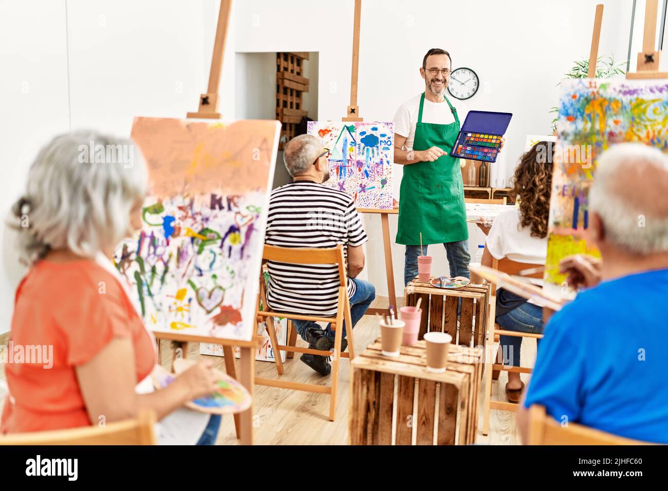 Group of middle age students having draw lesson at art studio Stock ...