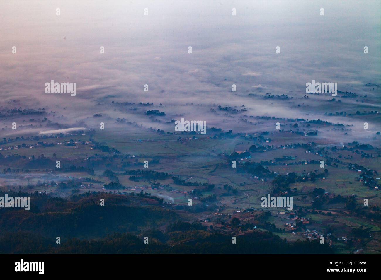 morning fog and chiminea in town from a top view Stock Photo - Alamy