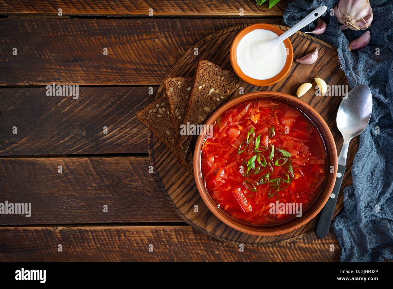 Traditional ukrainian borscht with green onion and sour cream ...