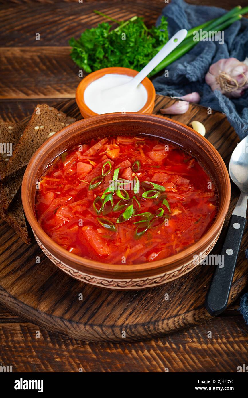 Traditional ukrainian borscht with green onion and sour cream ...
