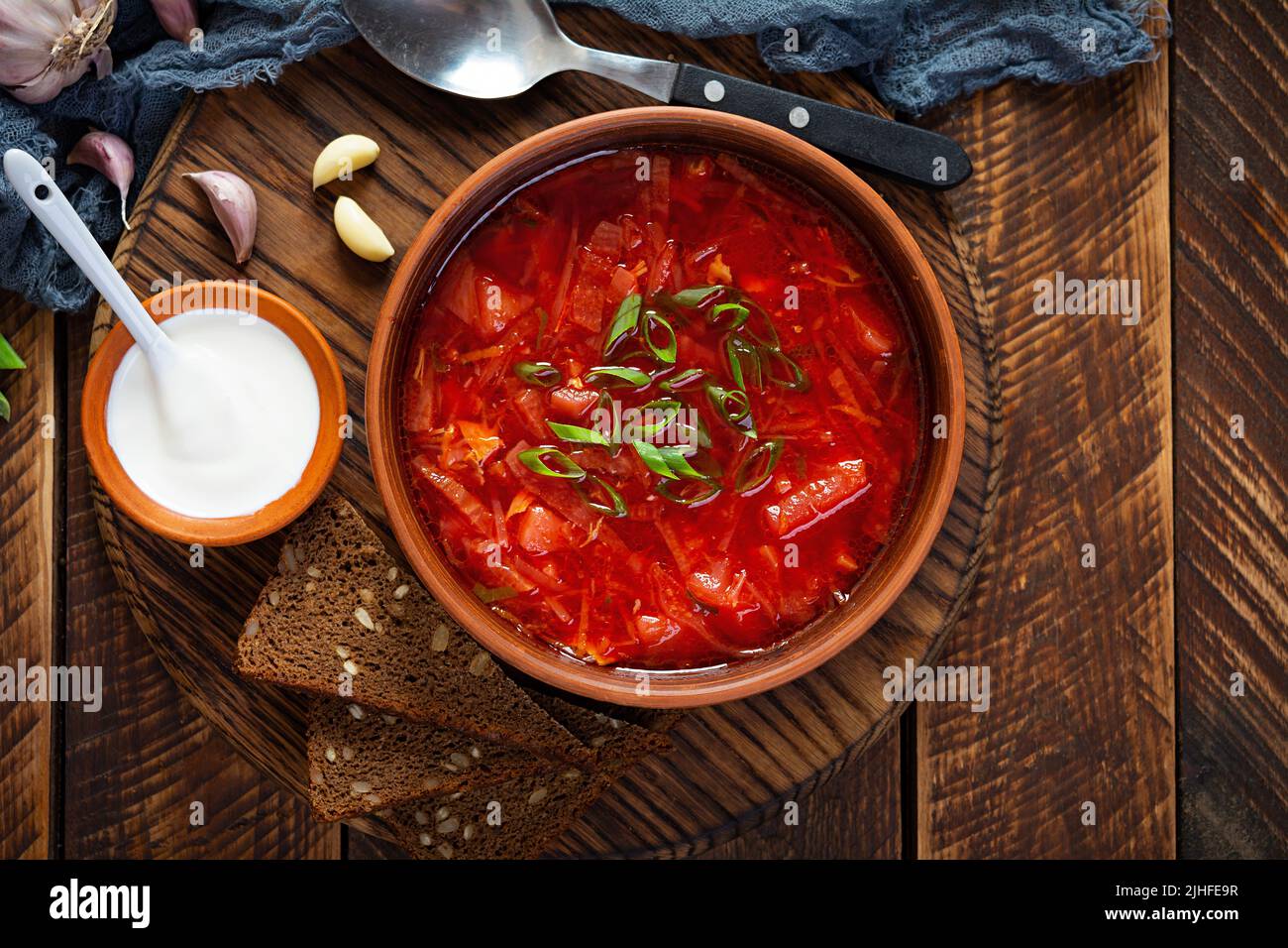 Traditional ukrainian borscht with green onion and sour cream ...