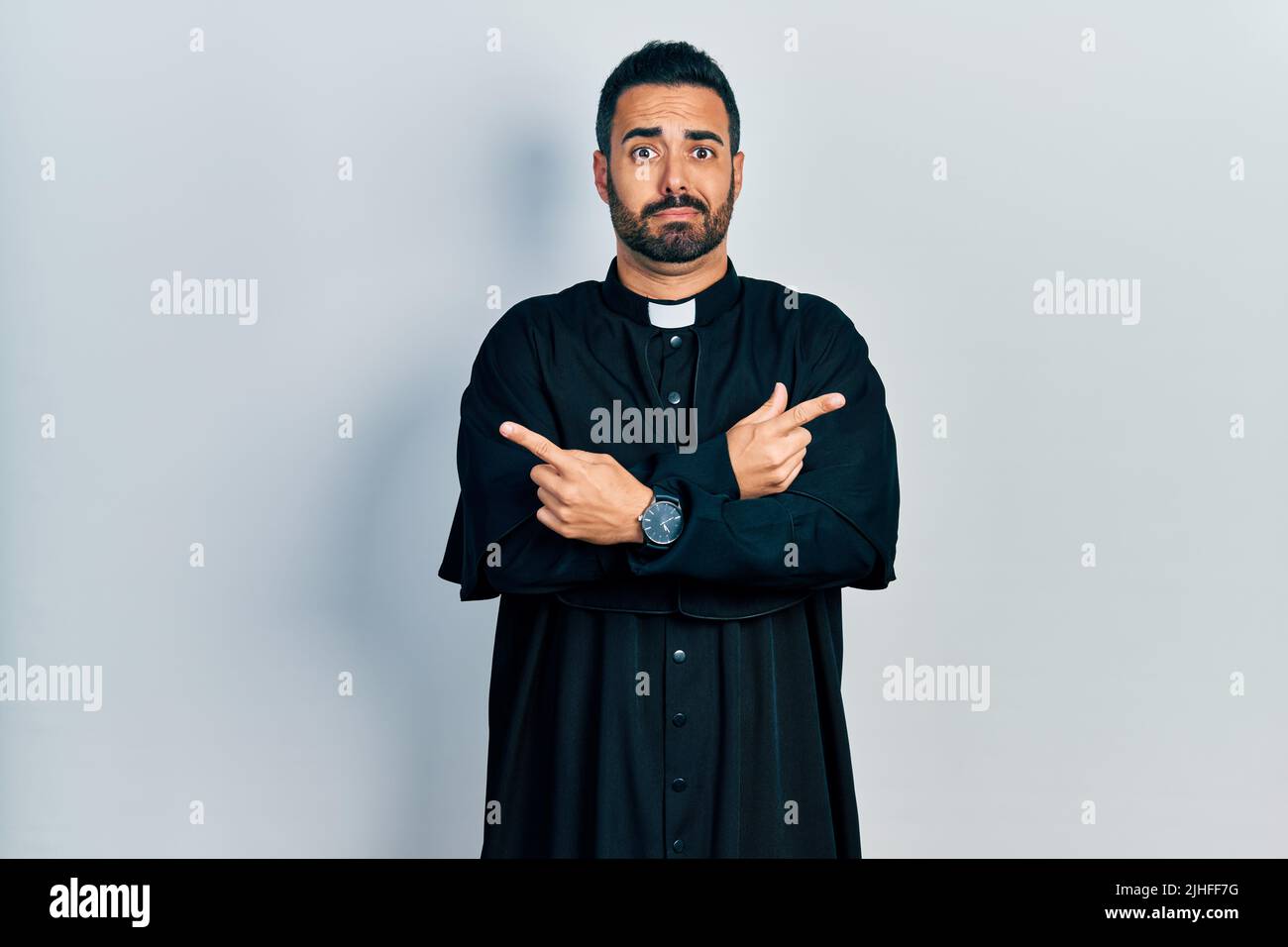 Handsome hispanic catholic priest hi-res stock photography and images ...