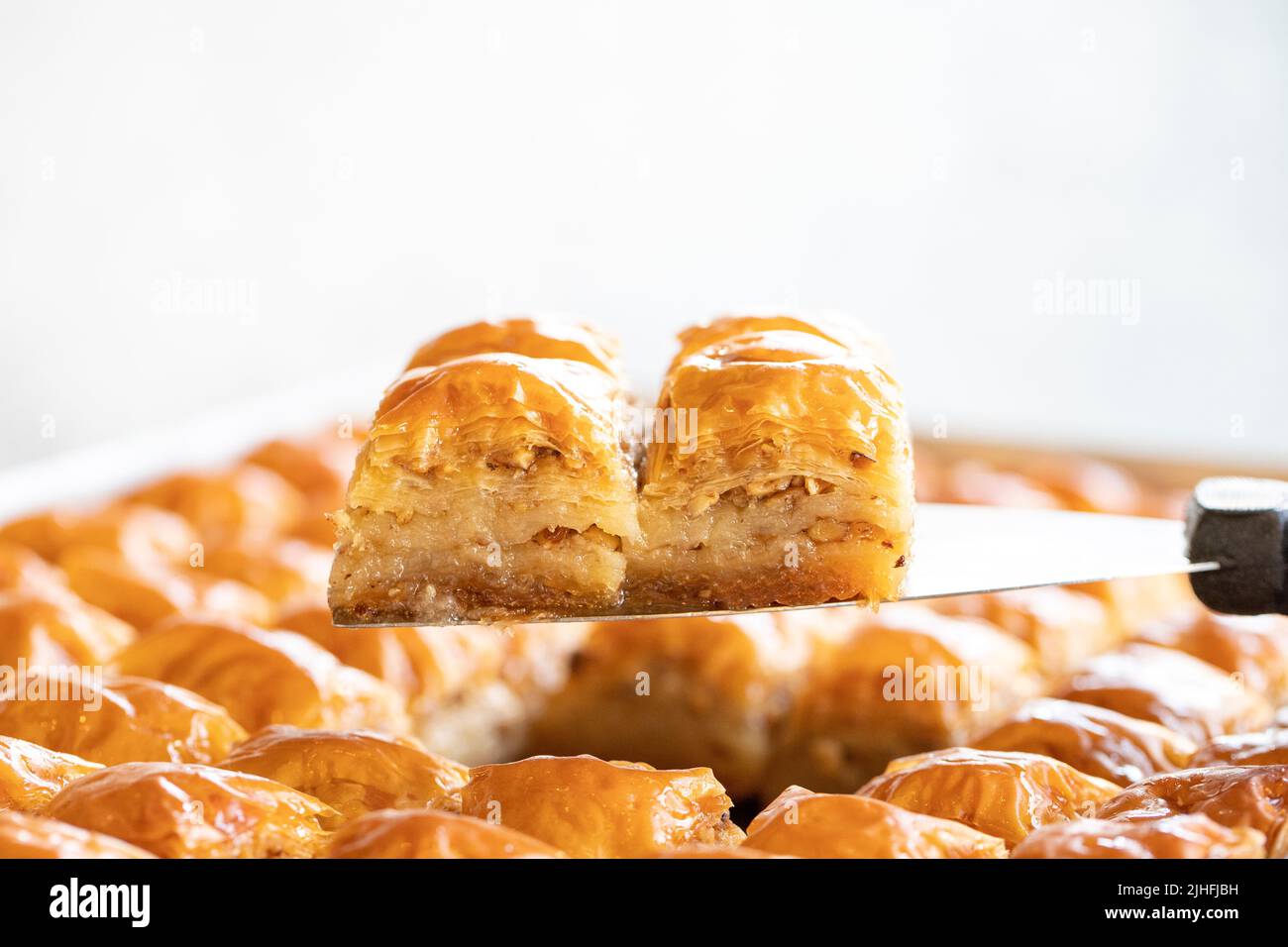 Walnut baklava. Close-up baklava in tray. Turkish cuisine Stock Photo ...
