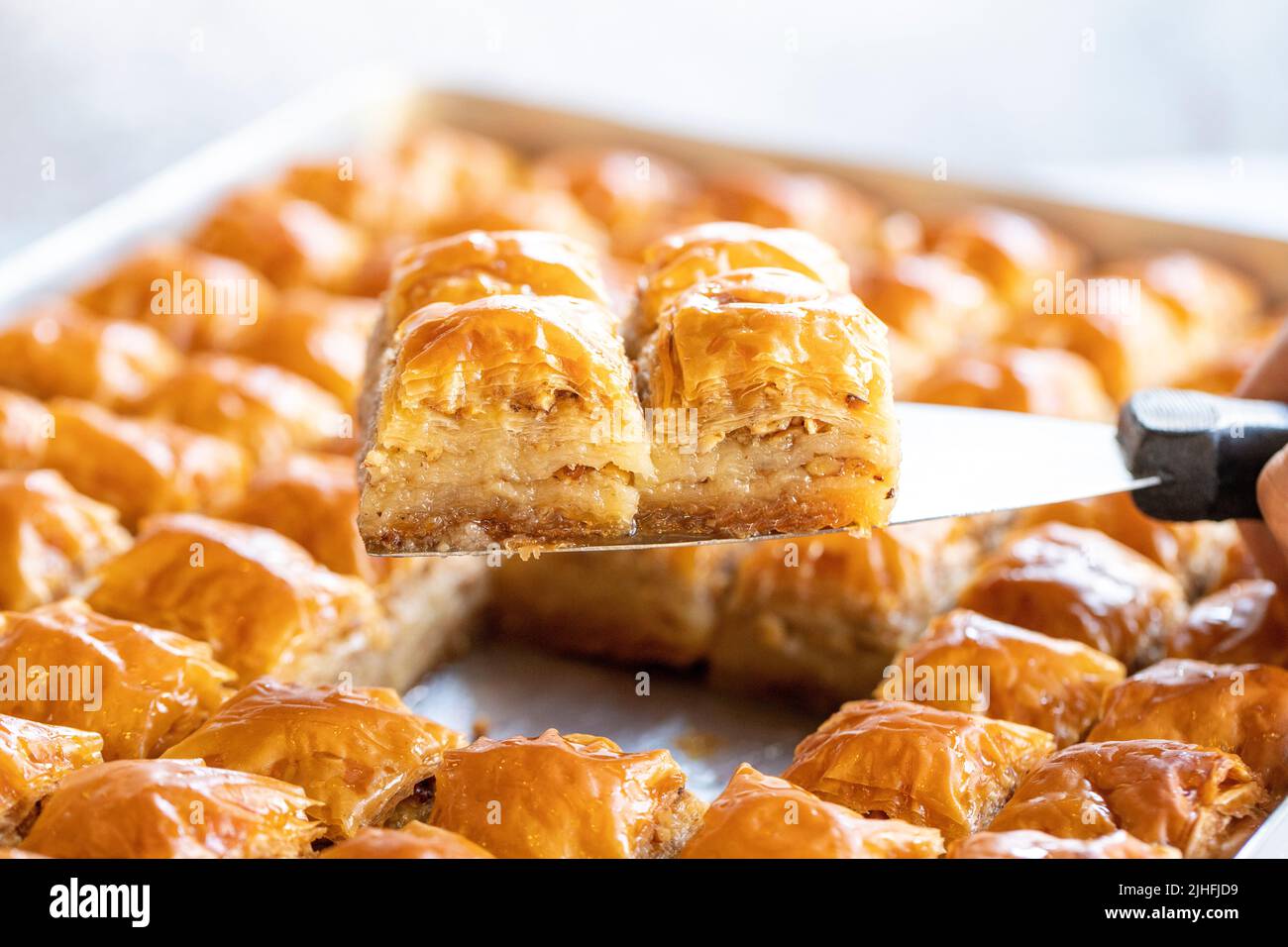 Walnut baklava. Close-up baklava in tray. Turkish cuisine Stock Photo ...