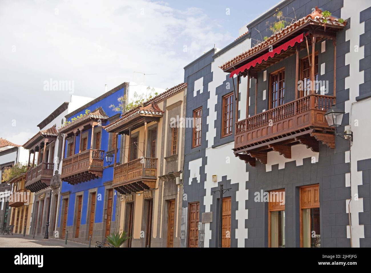 Historic manor houses with traditional wooden balconies, old town ...