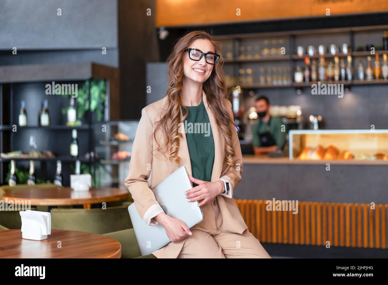 Business Woman Restaurant Owner With Laptop In Hands Dressed Elegant ...