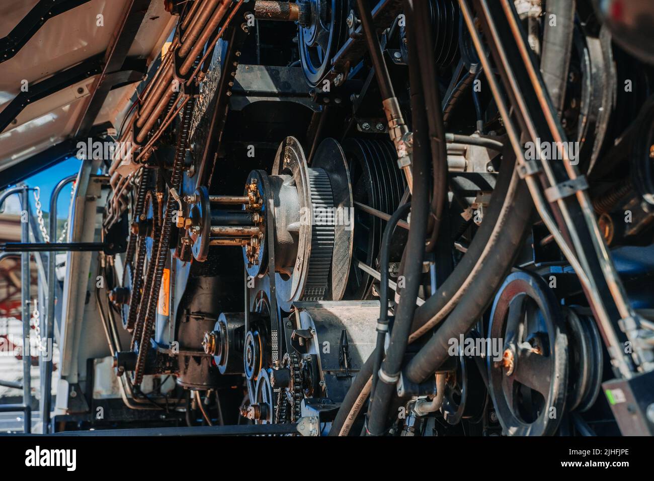 A view of the combine's motor. Big powerful industrial combine ...