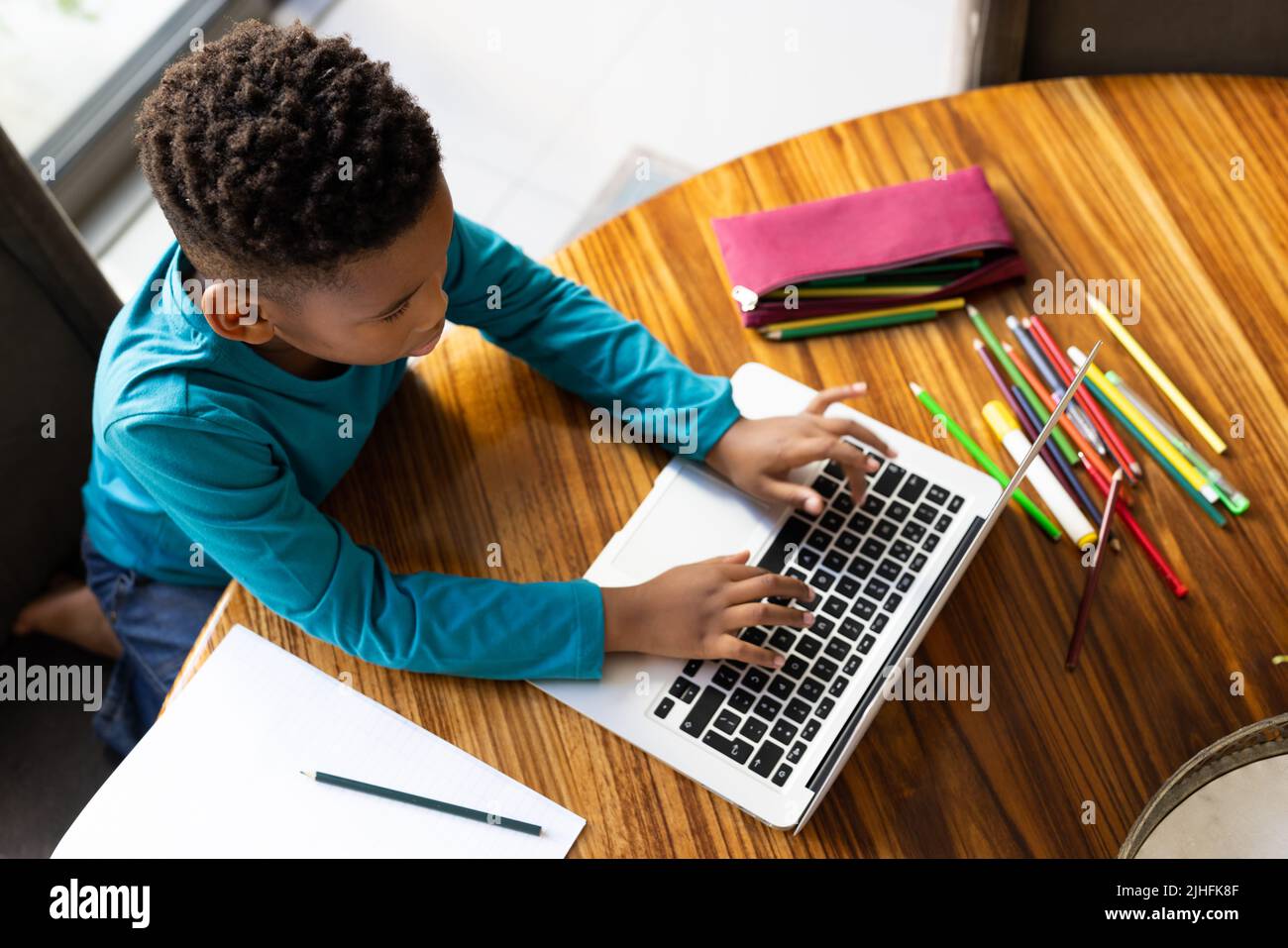 African american school boy technology hi-res stock photography and ...