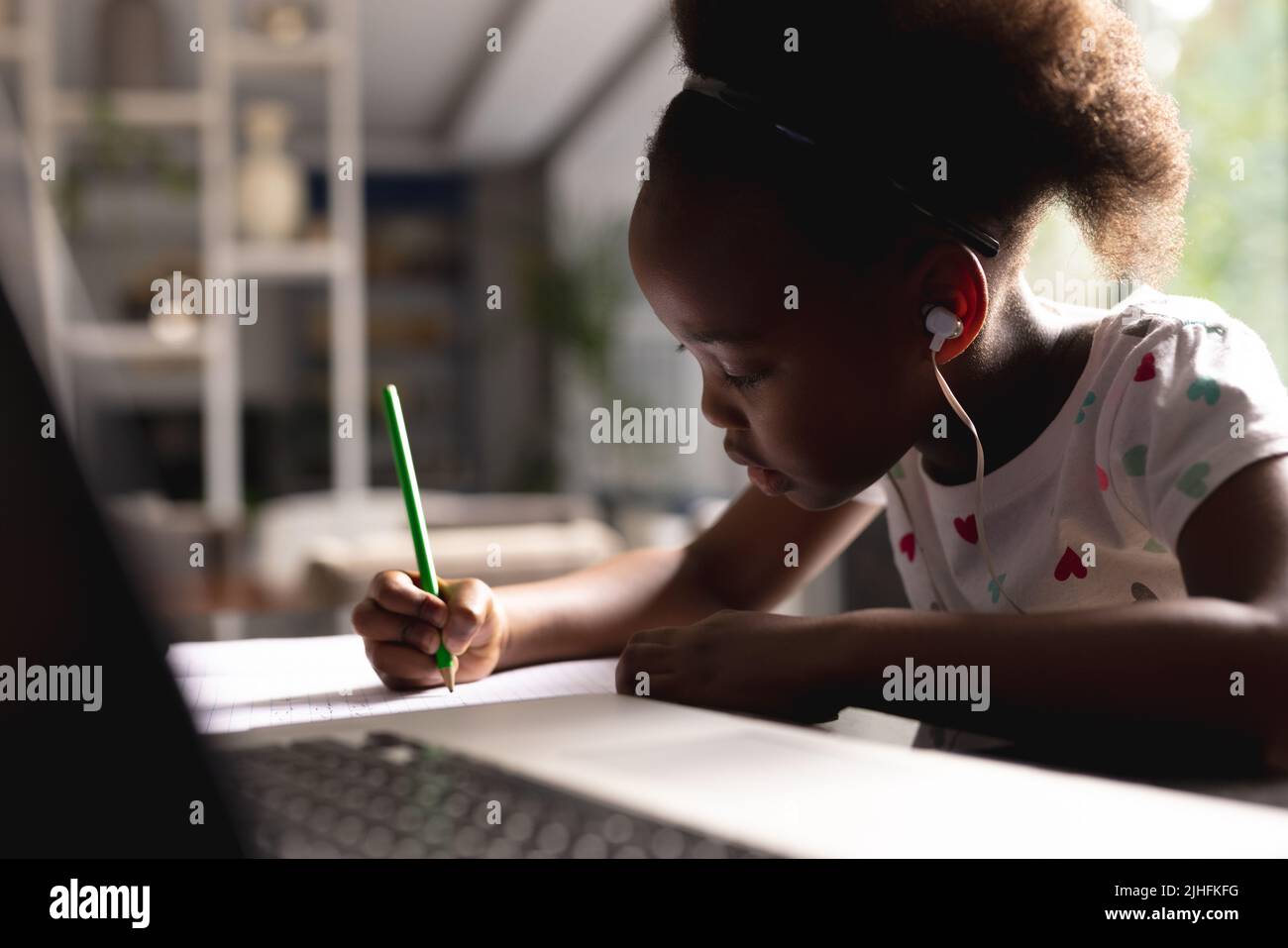 Image of african american girl doing homework Stock Photo - Alamy