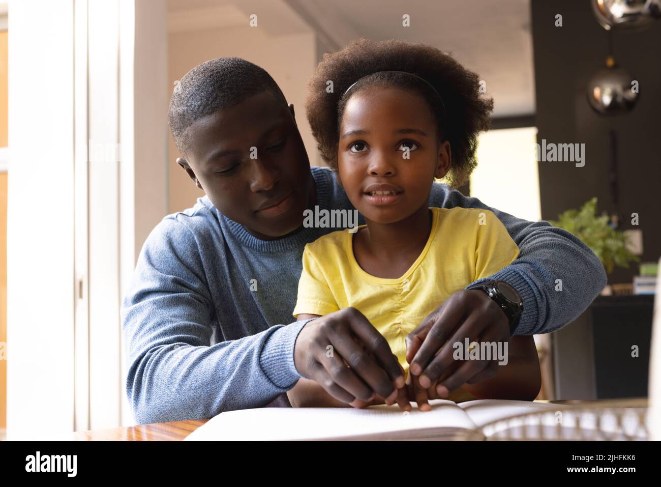 Image of happy african american father and daughter with sight ...