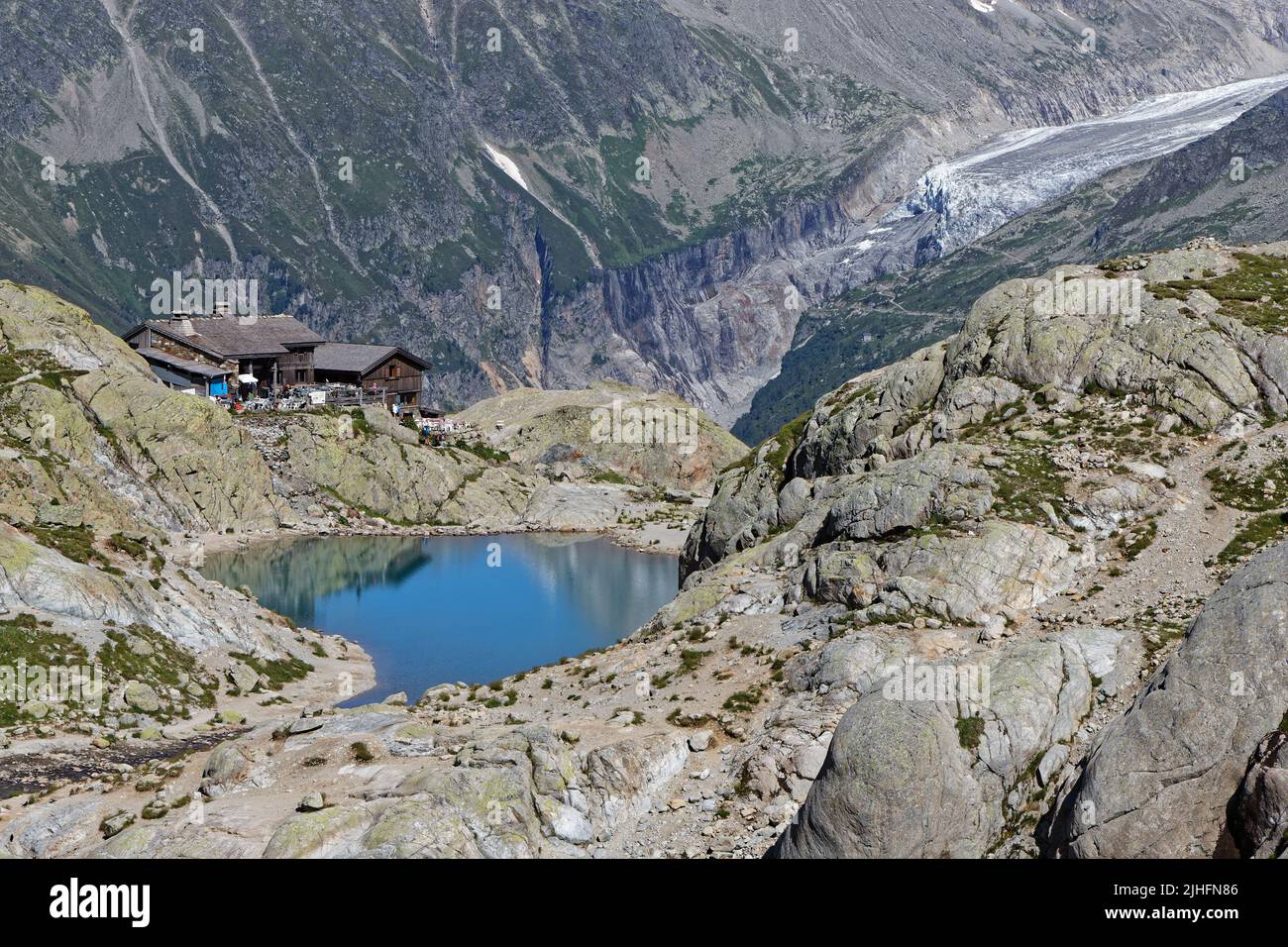 CHAMONIX, FRANCE, July 8, 2022 : The Refuge du Lac Blanc overlooks the ...