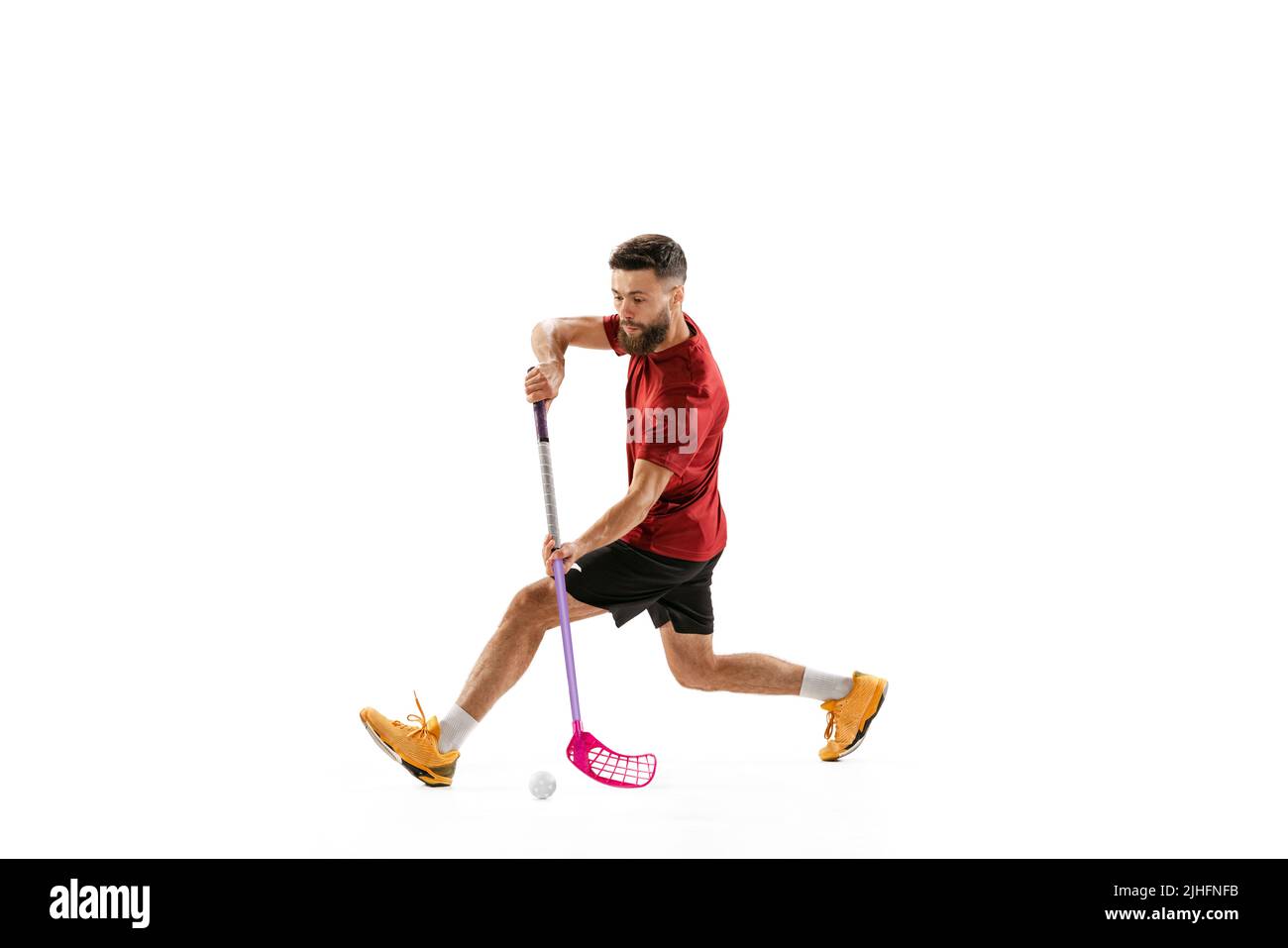 Floorball male player with floorball stick training isolated on white ...