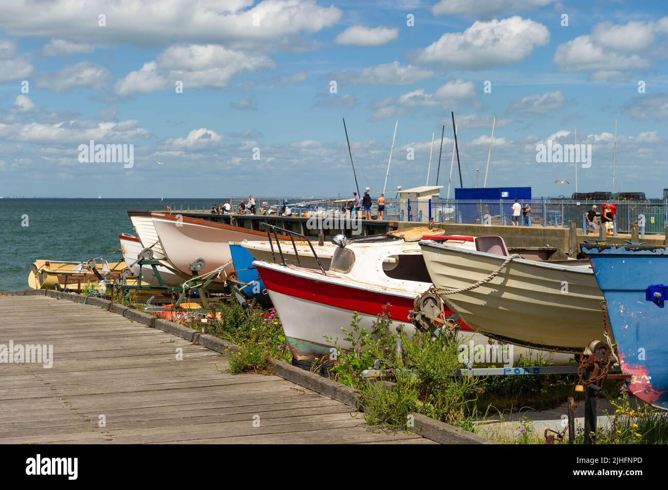 Boats on the seafront at Whitstable Bay, Kent, England Stock Photo - Alamy