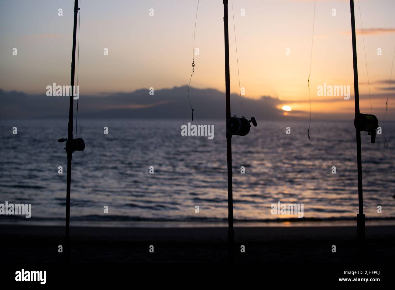 Fishing rods and fishing gear on the ocean coast close up Stock Photo ...