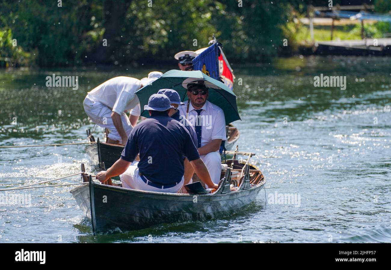 Swan Uppers rowing near Chertsey Lock in Surrey, during the ancient ...