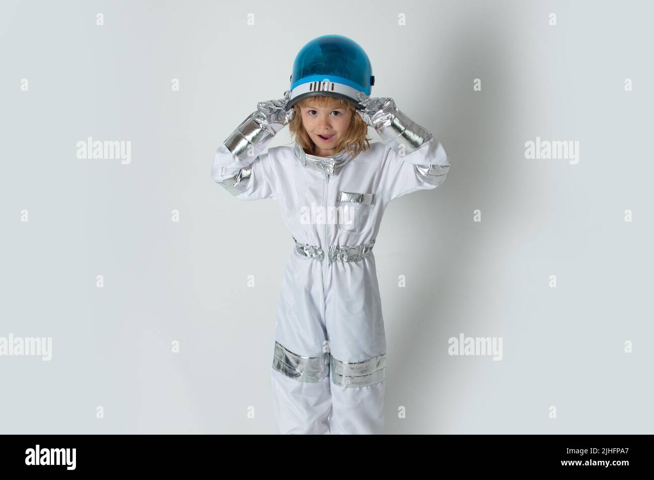 Kid boy exploring space. Portrait of cute kids in space suits ...