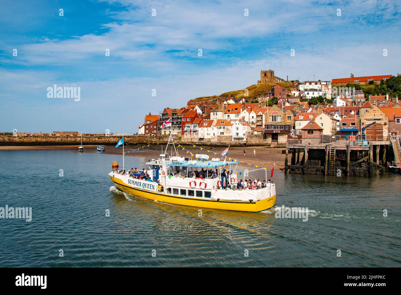 Whitby Harbour, River Esk, with tourist boats, Whitby, North Yorkshire ...