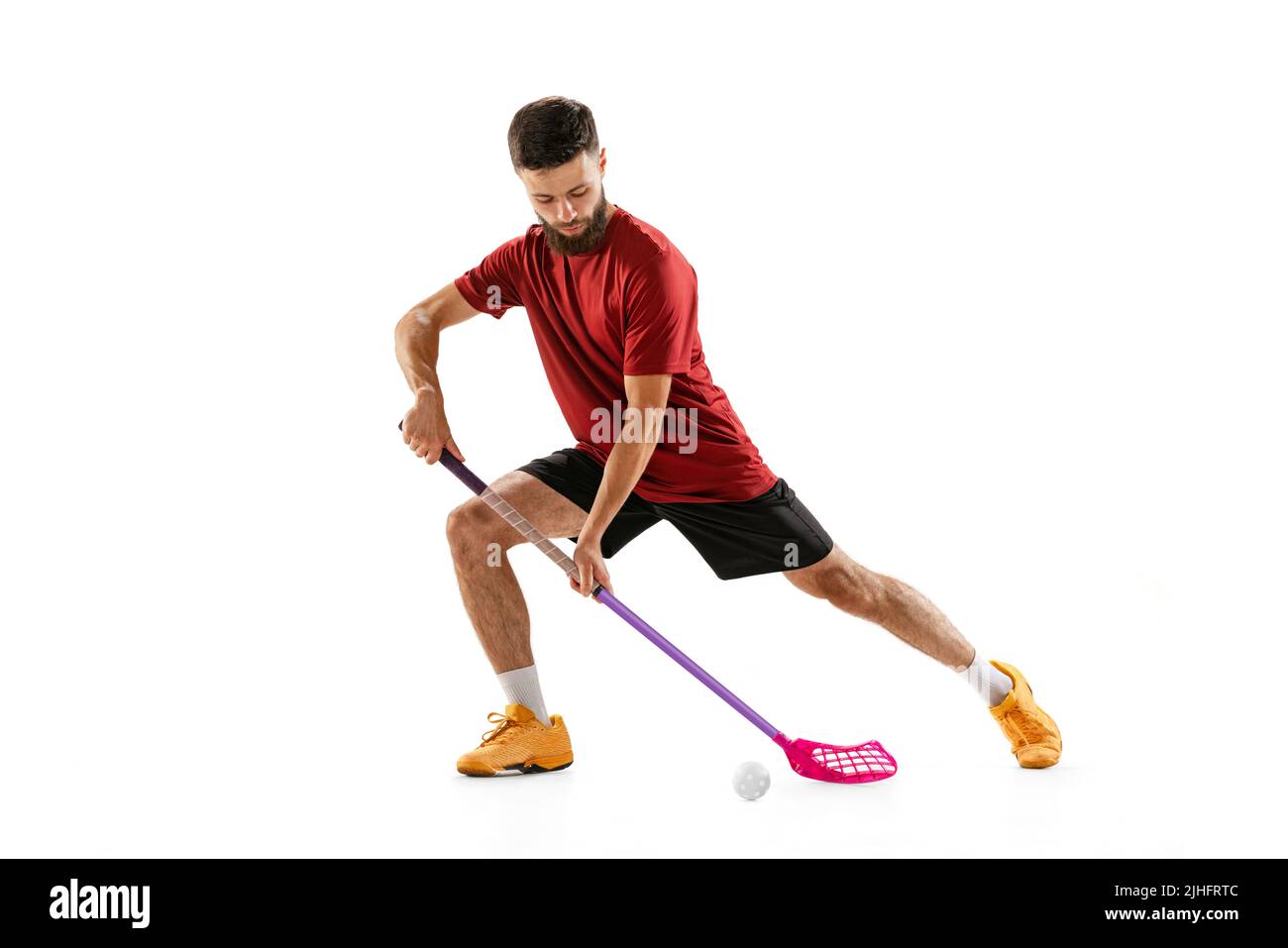 Floorball male player with floorball stick training isolated on white ...
