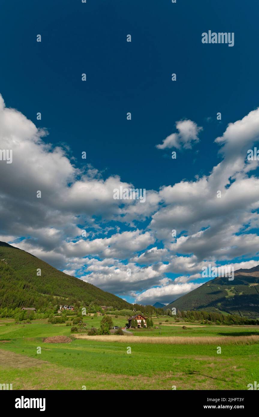 Italy, Lombardy, Valtellina, Bormio, Countryside whit Clouds Stock ...