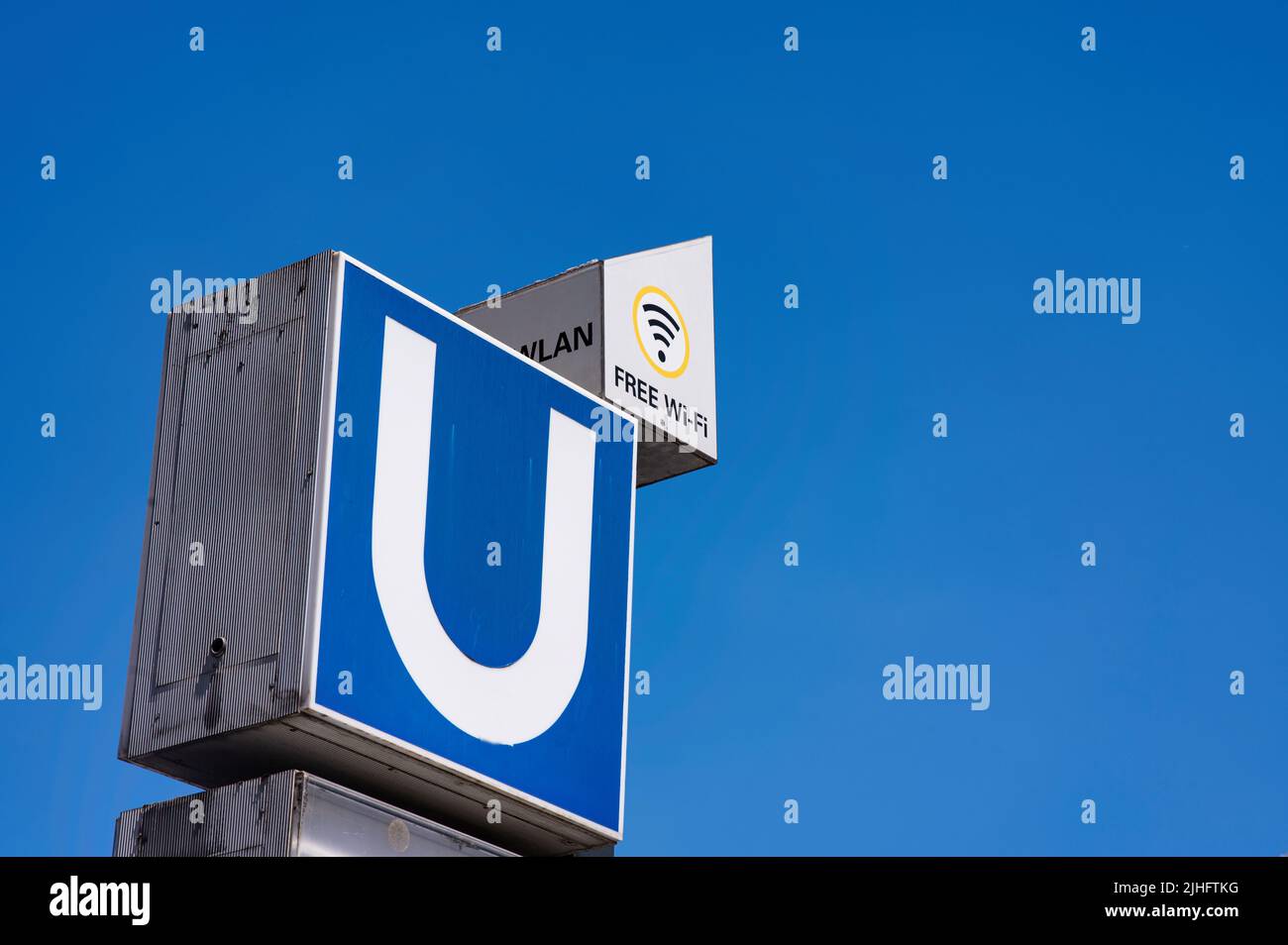 A close-up shot of the entrance sign to the subway in Munich, Germany ...