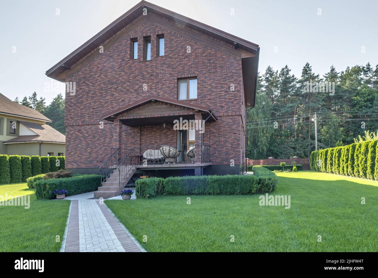 two-story concrete or brick country house Stock Photo - Alamy