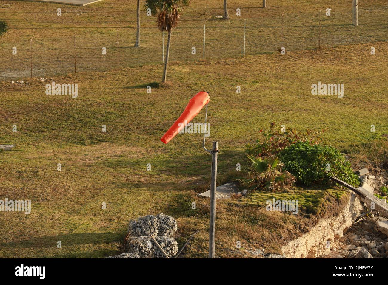 Windsock in front of a blue sky Stock Photo - Alamy
